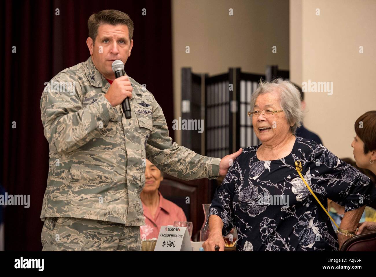 Col. Christopher Amrhein, 18th Wing vice commander, recognizes Fumiko ...