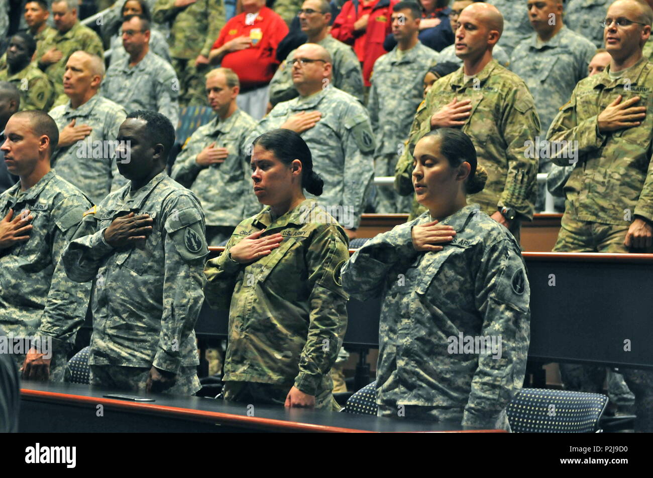 Soldiers from the 63rd Regional Support Command perform the Pledge of ...