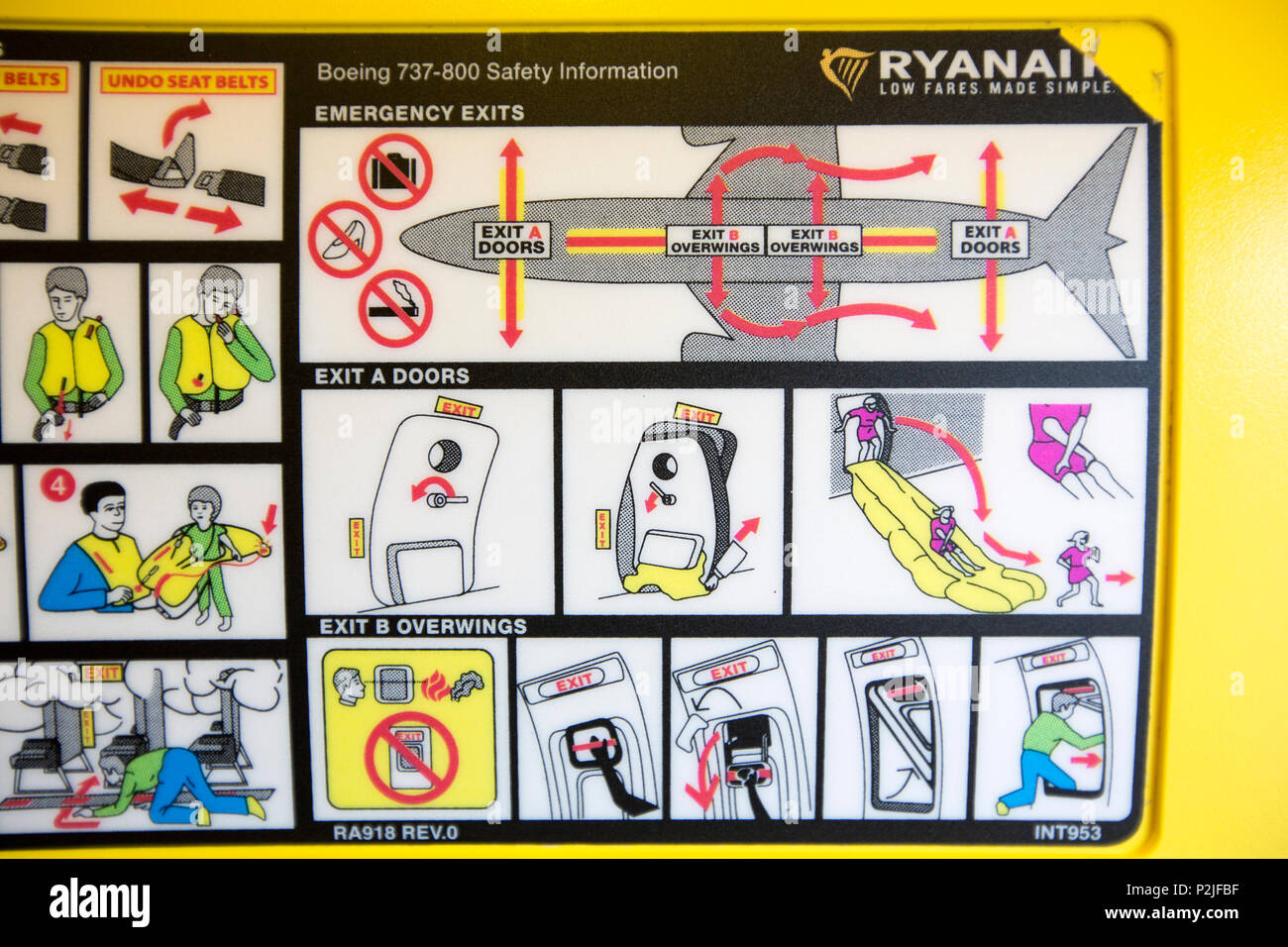 Safety instructions on a seat back of an airplane Stock Photo - Alamy