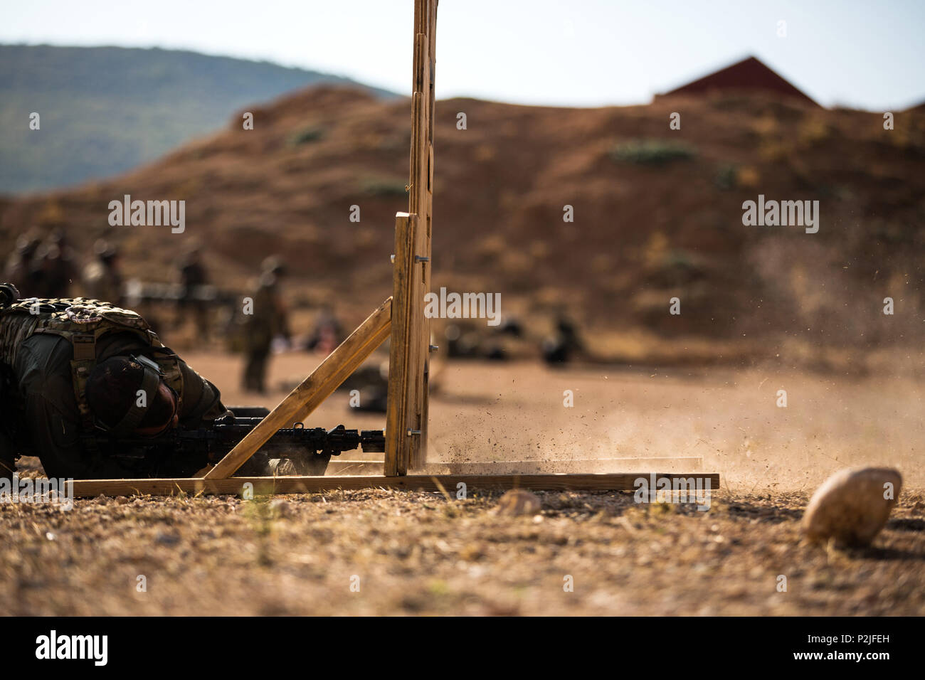 Greek special forces and U.S. Navy Seals engage in a firing drill at a ...