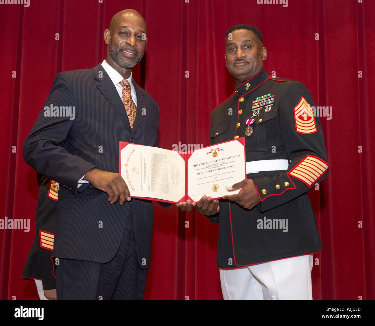 From left to right, U.S. Marine Corps 1st Sgt. Jerry Neal (ret.) stands ...