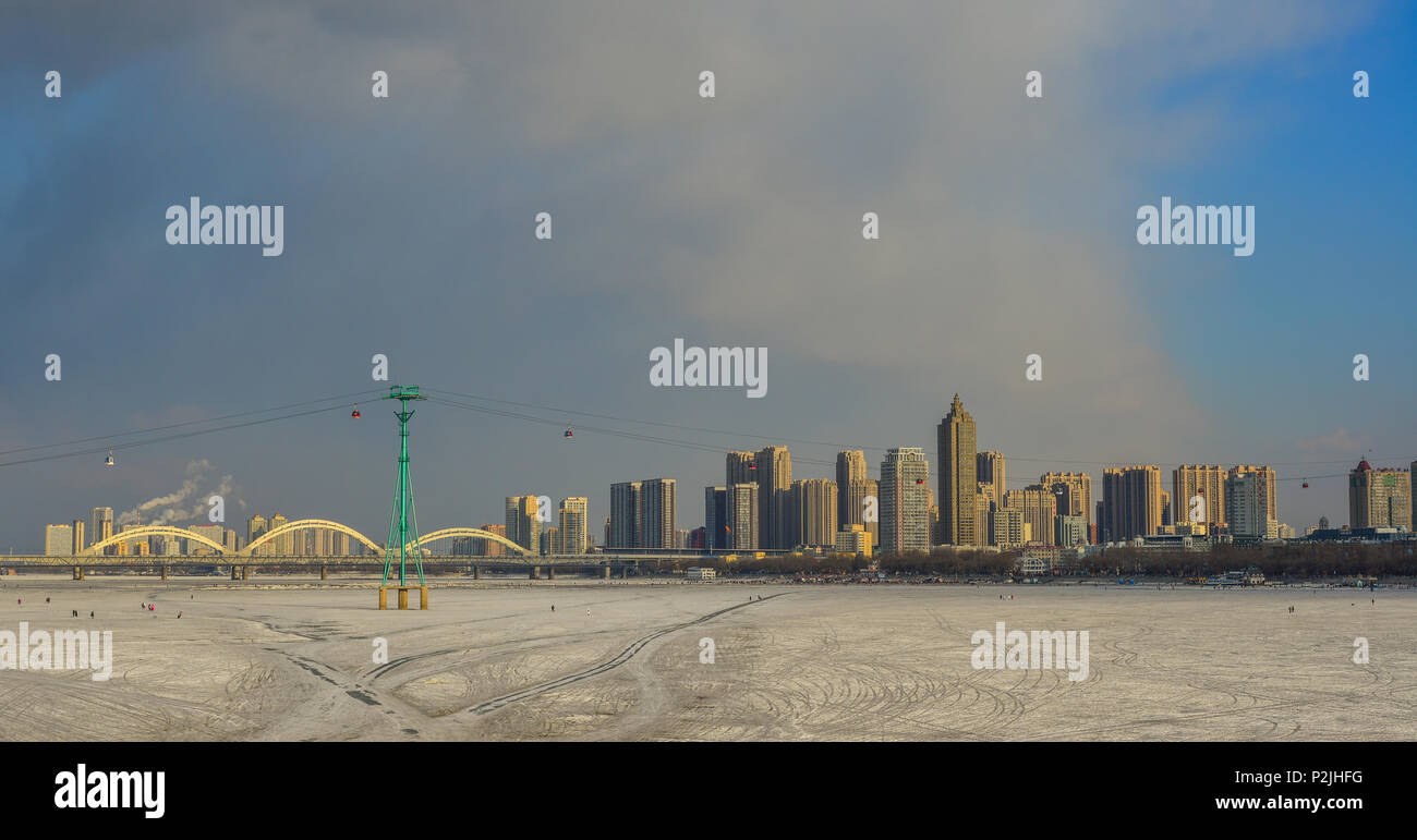 Harbin, China - Feb 22, 2018. Cityscape with ice river in Harbin, China ...