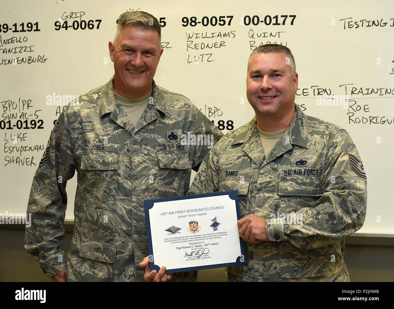 Master Sgt. Donald Jones recognizes Technical Sgt. Richard Banks as ...