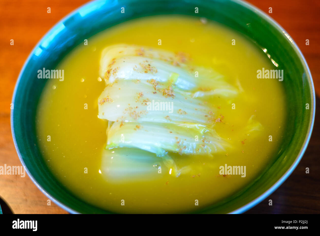 Seasonal white bok choy cabbage cooked in a Duck Bouillon served in ...