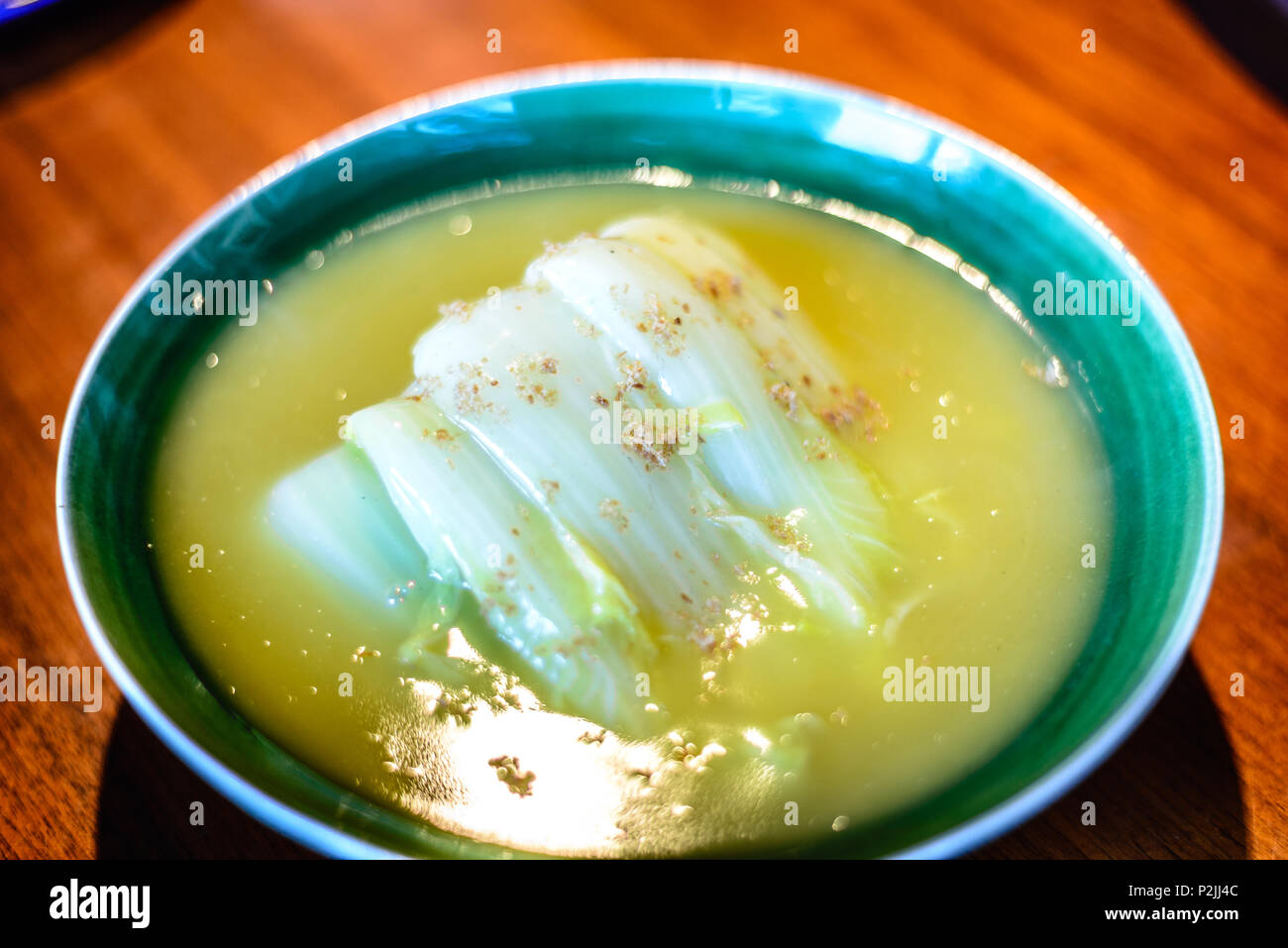 Seasonal white bok choy cabbage cooked in a Duck Bouillon served in ...