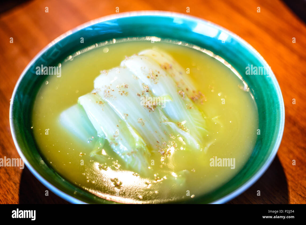 Seasonal white bok choy cabbage cooked in a Duck Bouillon served in ...