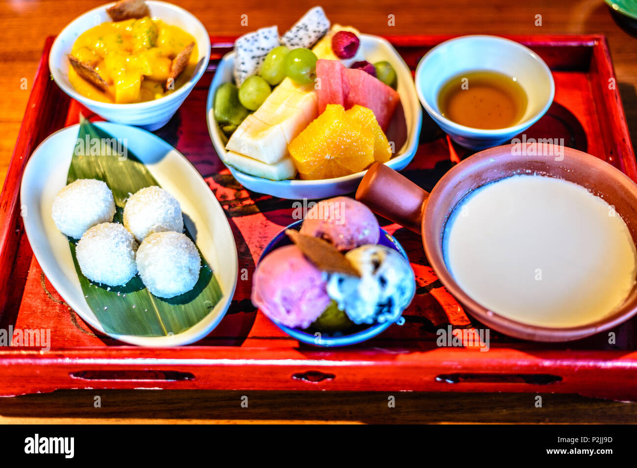 dessert platter with asian chinese and western desserts served on a ...