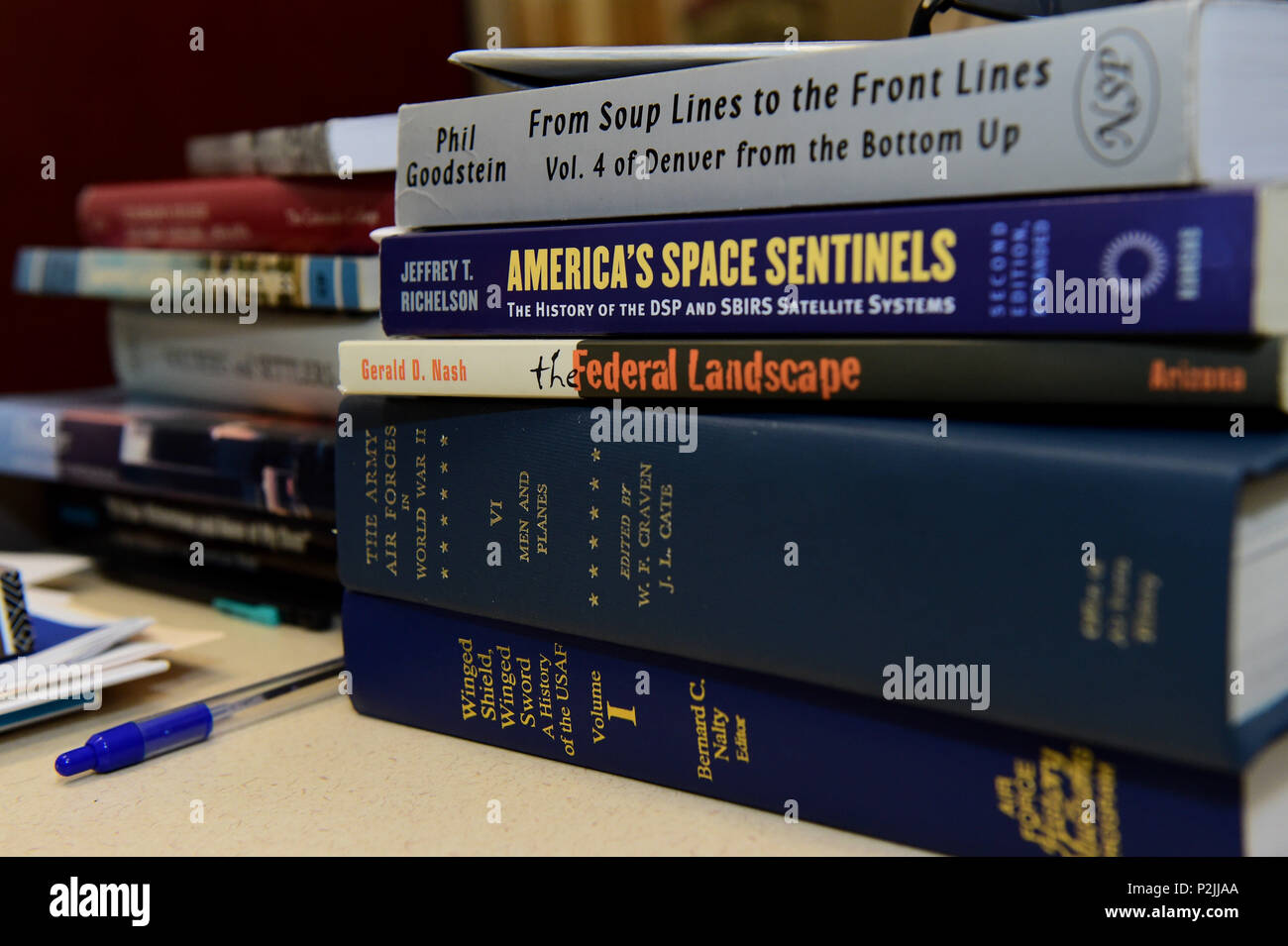 History books are displayed on the desk of Christopher McCune, 460th ...