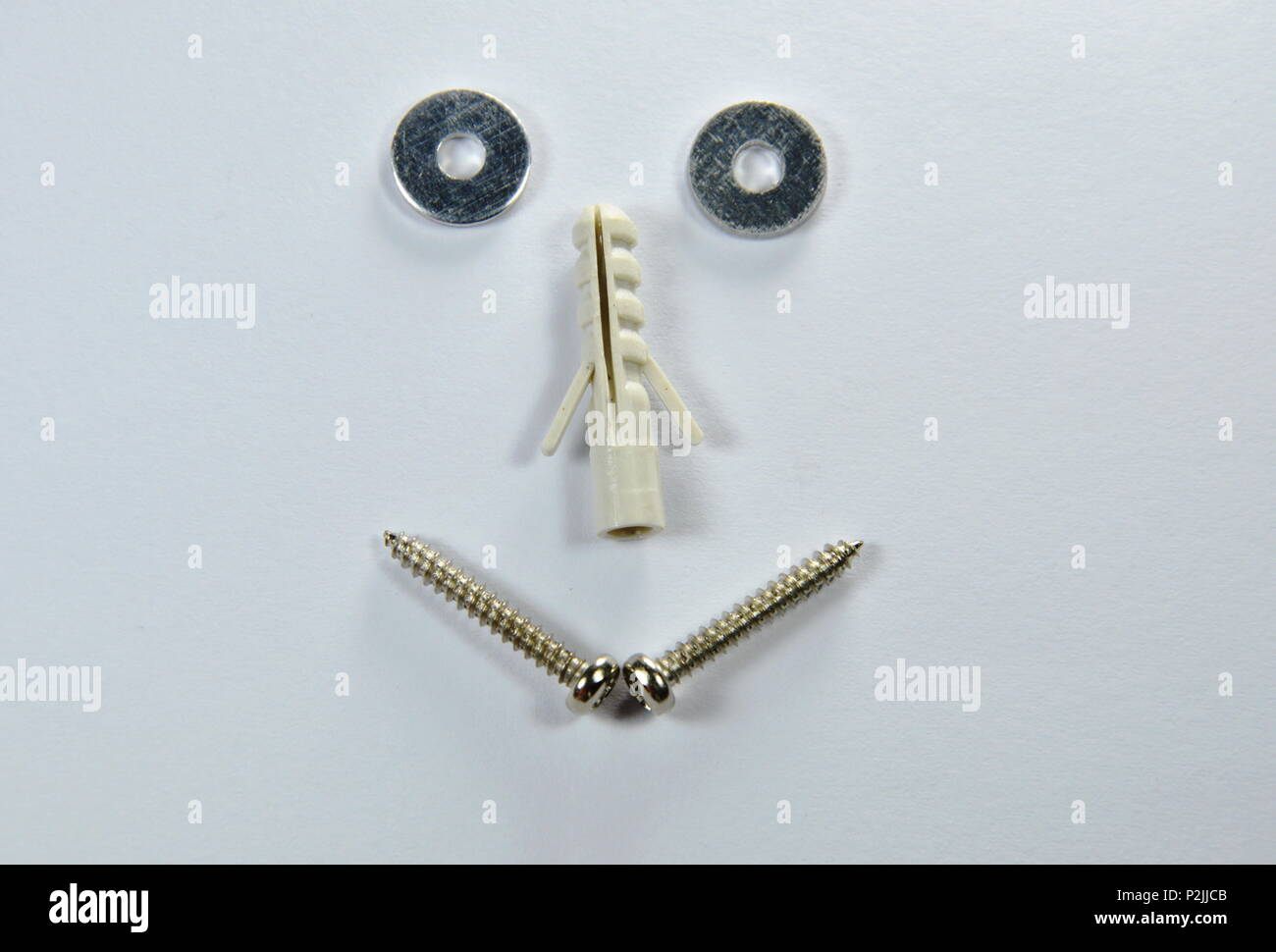 screw nut alignment smiling face Stock Photo - Alamy