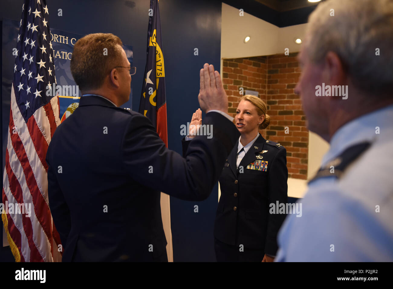 U.S. Air Force Lt. Col. (Ret) Royce Terrell (right), watches as Brig ...