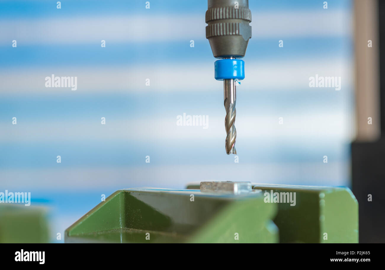 Processing of the plastic workpiece on CNC milling machine Stock Photo ...