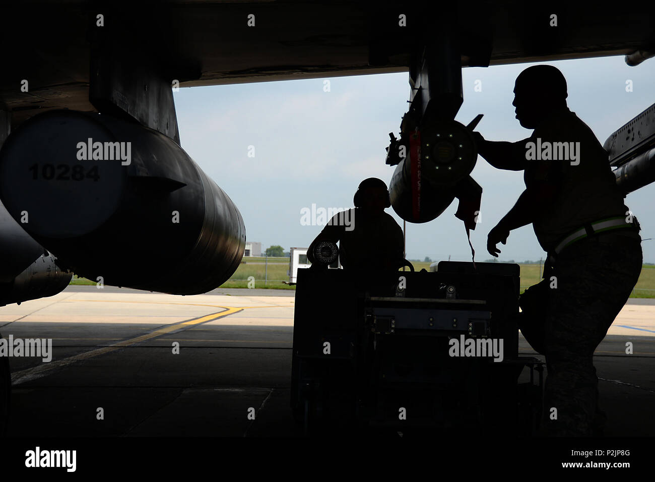U.S. Air Force weapons loaders with the 177th Maintenance Group ...