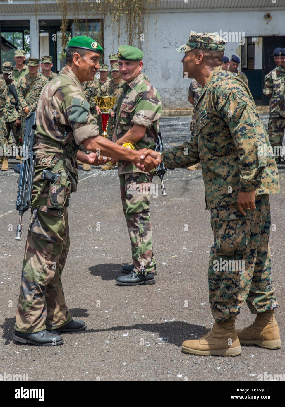 TARAVAO Tahiti – U.S. Marine Maj. David Rainey, right, the commanding ...
