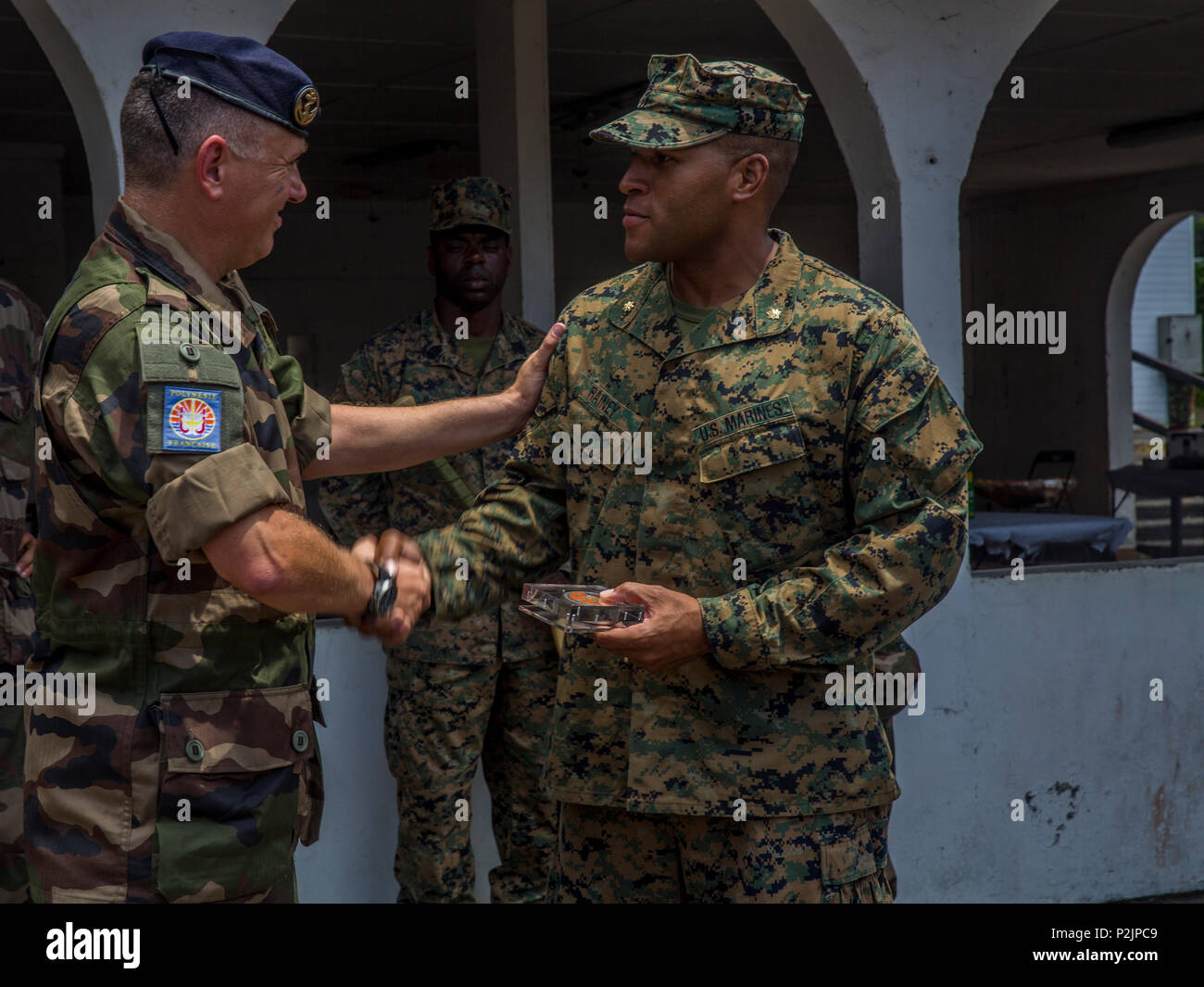 TARAVAO, Tahiti – U.S. Marine Maj. David Rainey, right, the commanding ...
