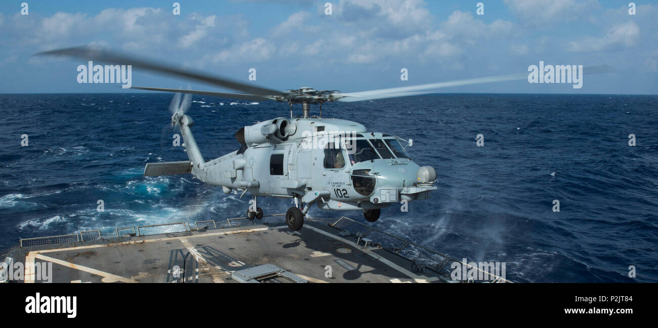 160901-N-SU278-100 SOUTH CHINA SEA (Sep. 1, 2016) An MH-60R helicopter ...