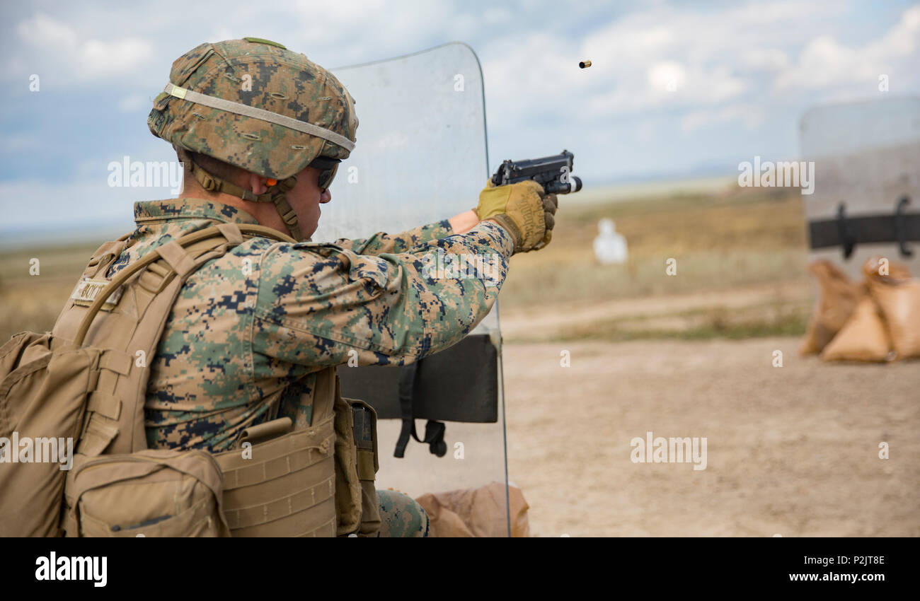A U.S. Marine attached to the Black Sea Rotational Force fires an M9A1 on an advanced urban ...