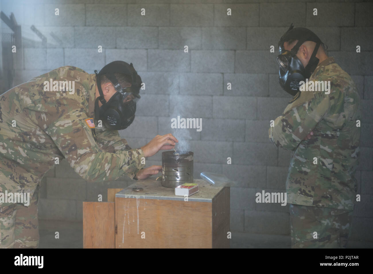 Two U.S. Soldiers assigned to the 650th Military Intelligence Group ...