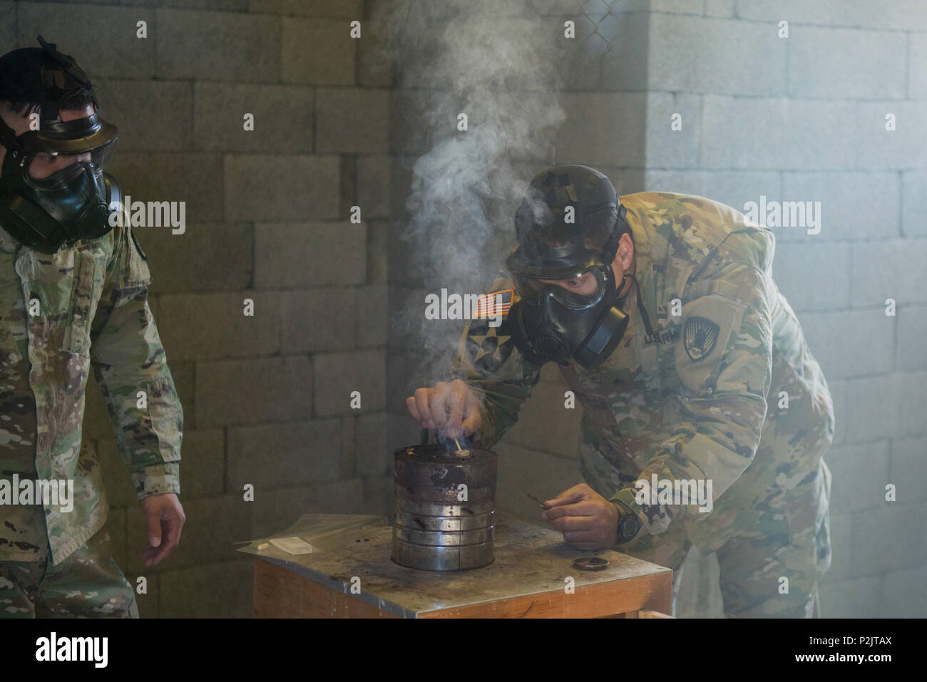 Two U.S. Soldiers assigned to the 650th Military Intelligence Group ...