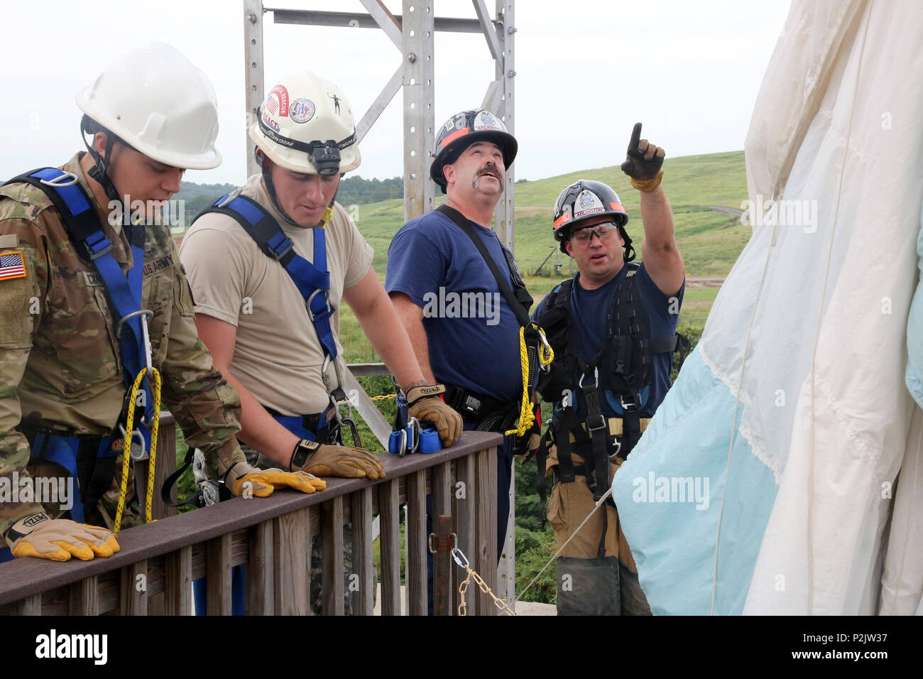 U.S. Soldiers, assigned to the 911th Technical Rescue Engineering ...