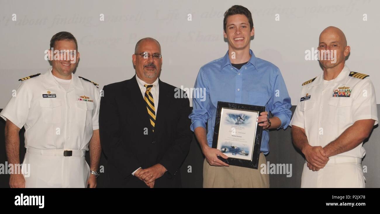 DAHLGREN, Va. - Michael Denham receives his certificate of achievement ...