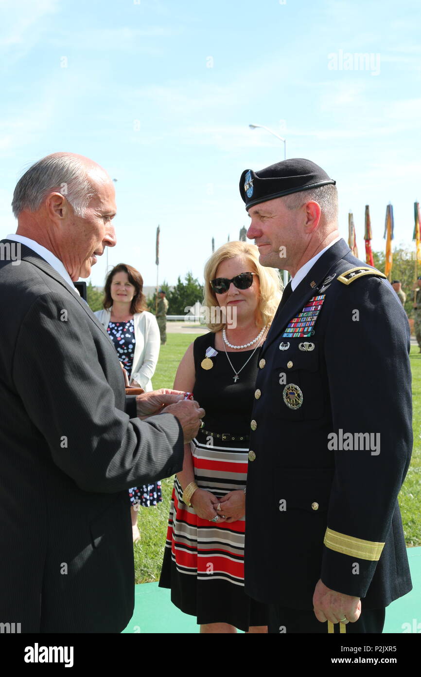 Retired Maj. Gen. Virgil L. Packett II, presents Lt. Gen. Perry L ...