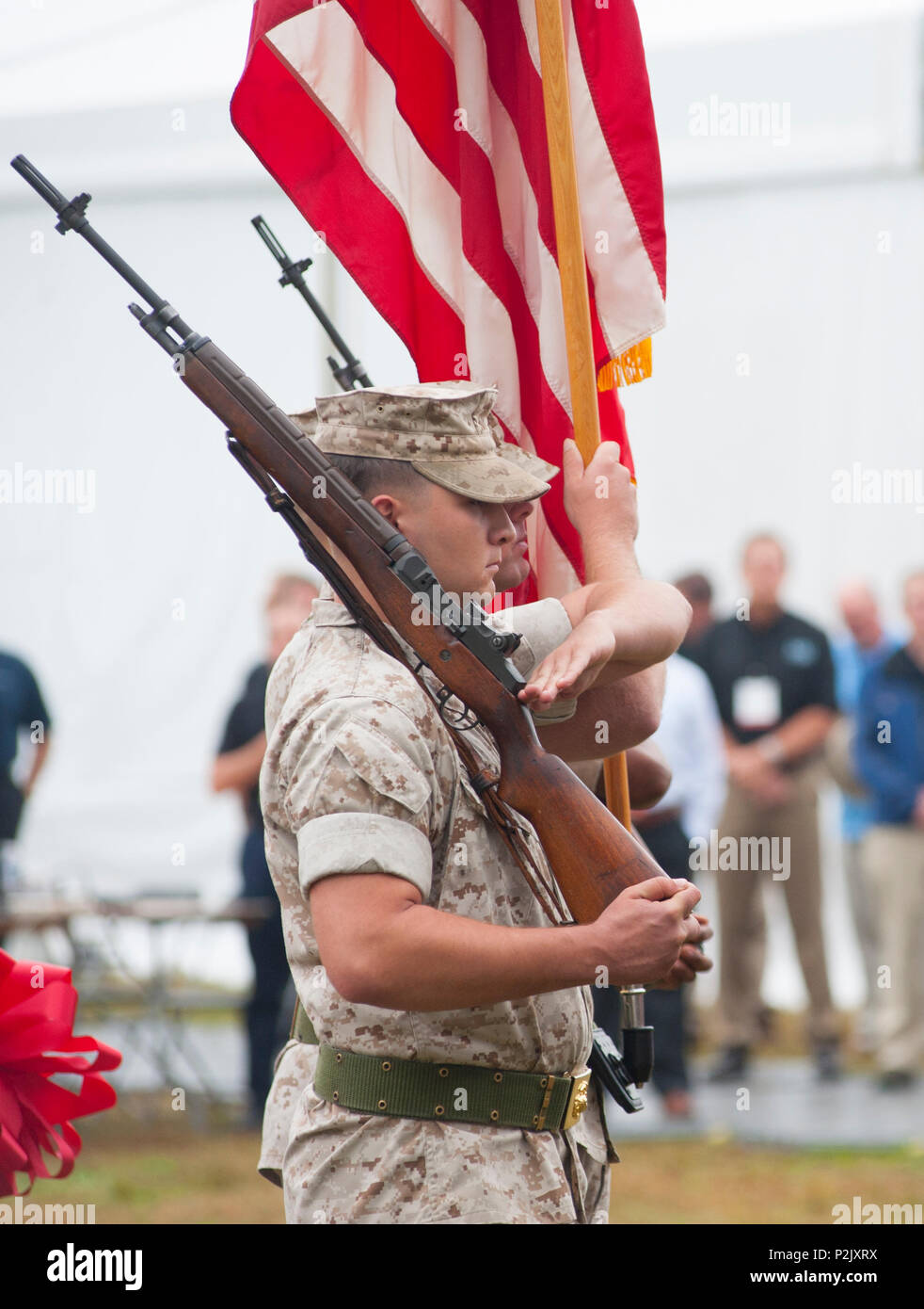 The Marine Corps Base Quantico Color Guard salutes the colors during ...