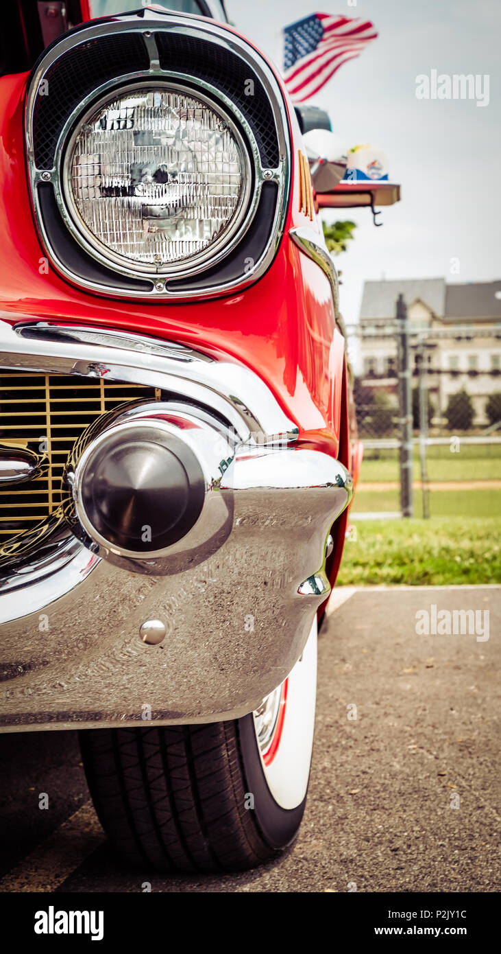 An American flag waves behind a fifties classic American car Stock ...