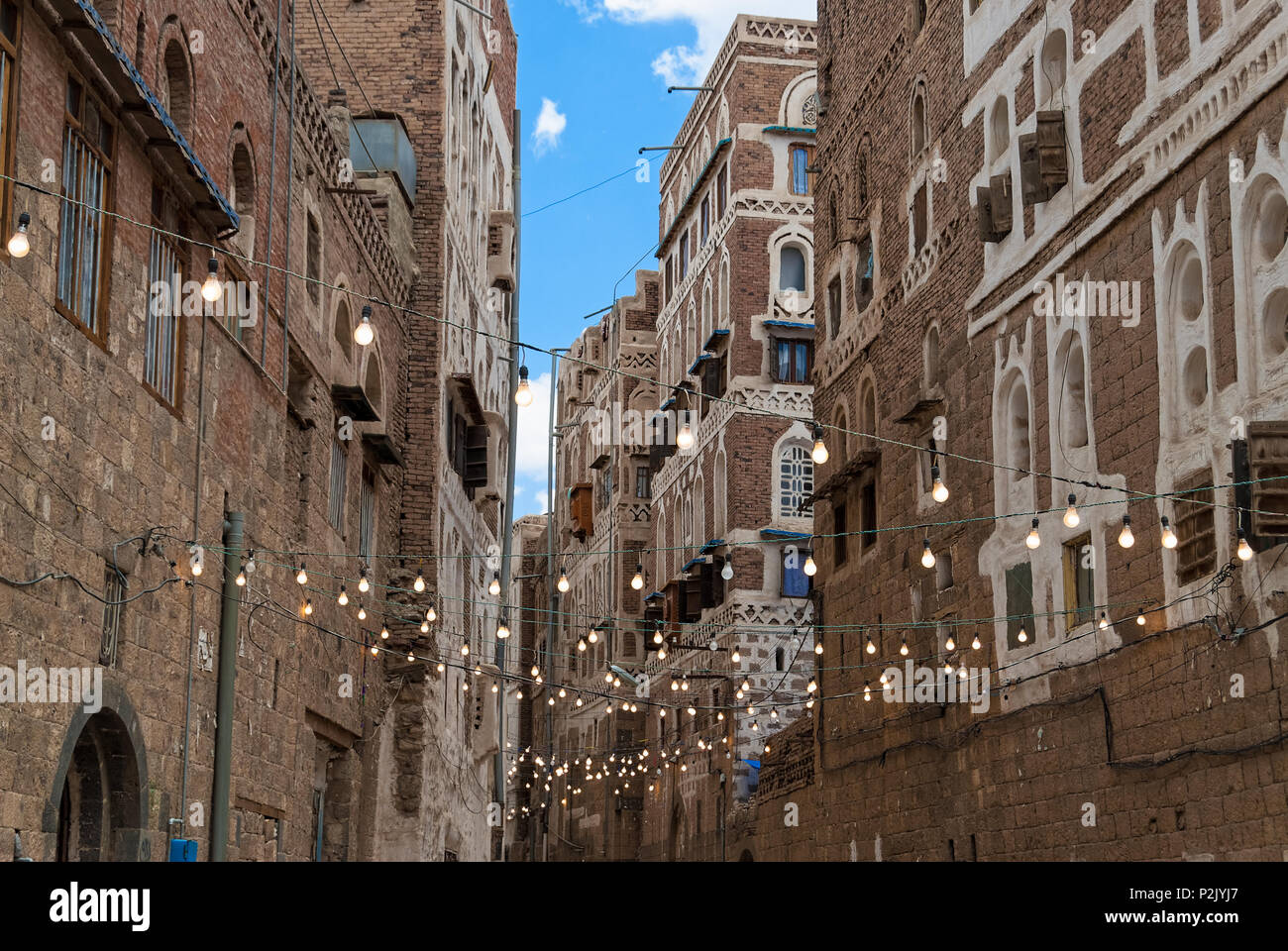 Multi-storey traditional buildings made of stone in Sanaa, Yemen Stock ...