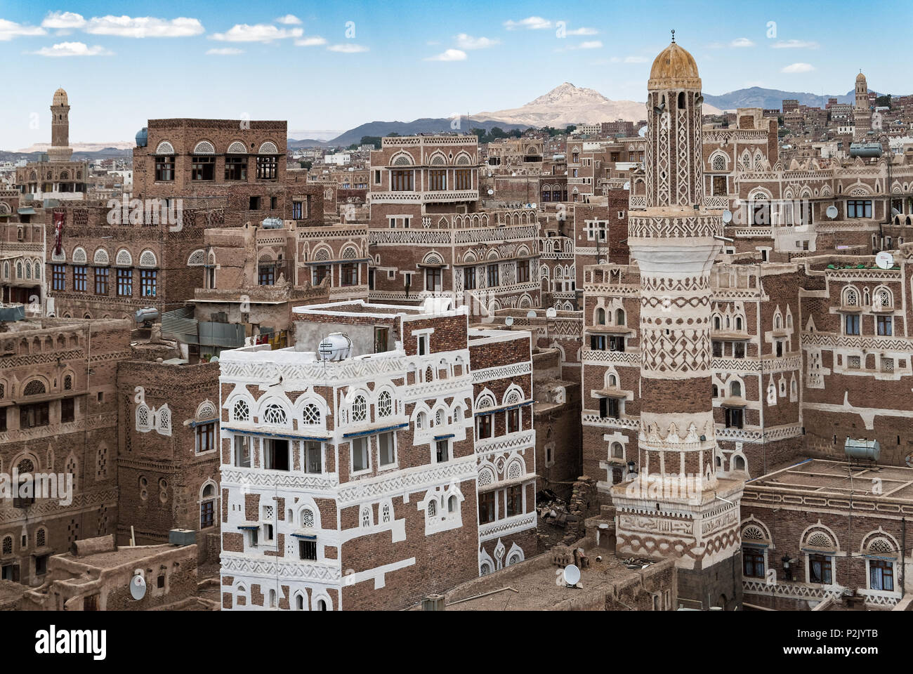 Multi-storey traditional buildings made of stone in Sanaa, Yemen Stock ...