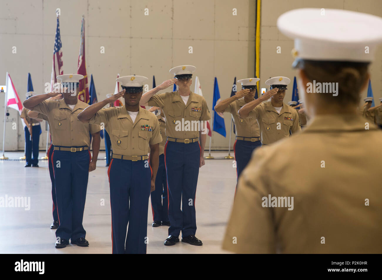 U.S. Marines with Marine Helicopter Squadron 1 perform a present arms ...