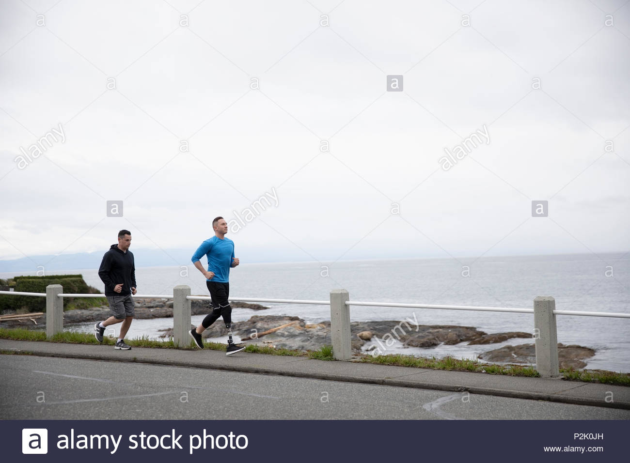 Man running along boardwalk hi-res stock photography and images - Alamy