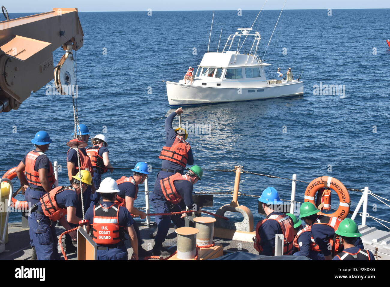 U.S. Coast Guardsman assigned to the CGC Campbell (WMEC 909) prepare to ...