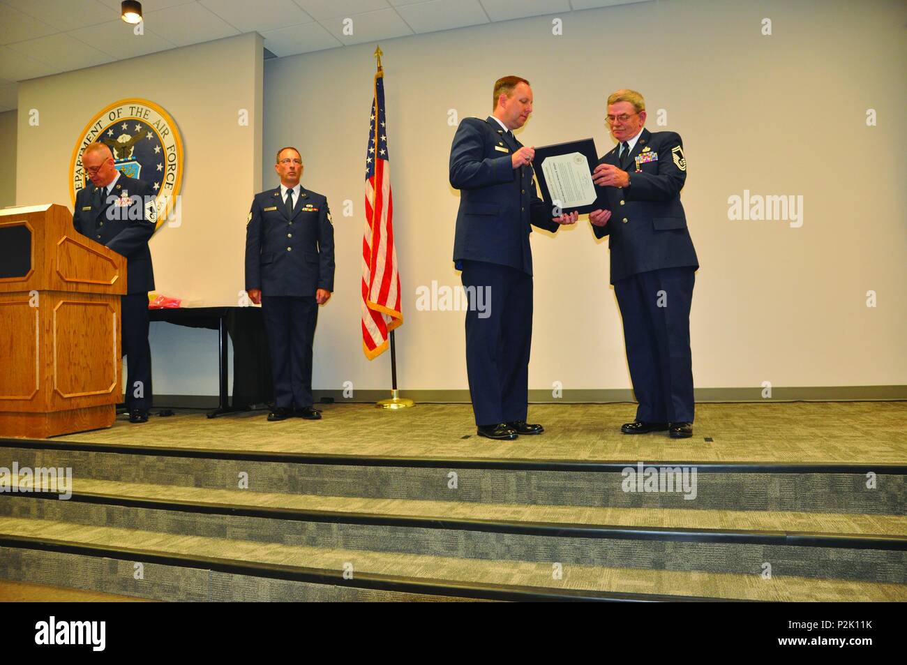 Senior Master Sgt. Herbert Pfeiffer receives his retirement paperwork ...