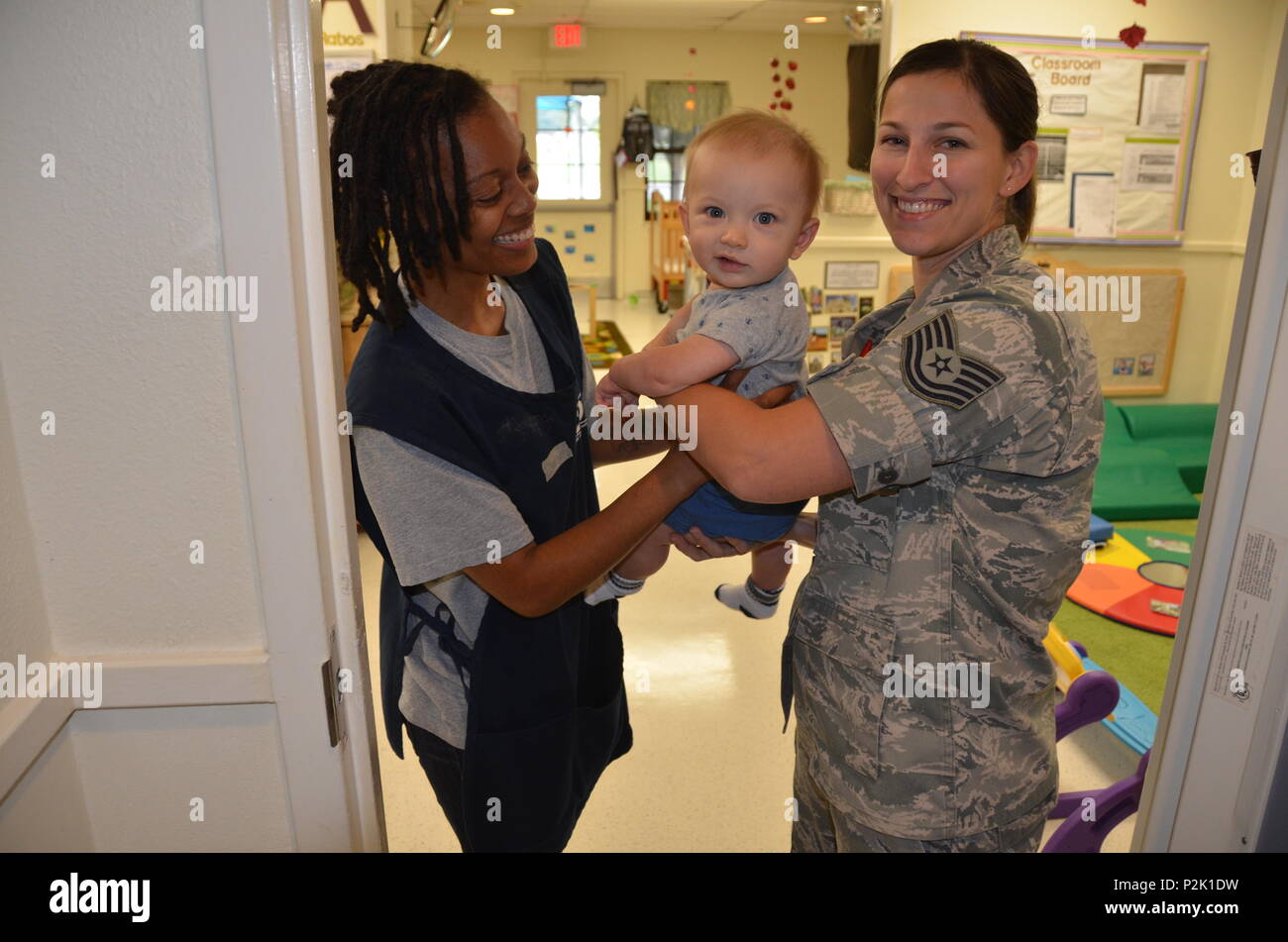 Technical Sgt. Crystal Dean drops off her son Isaiah, 6 months, to ...