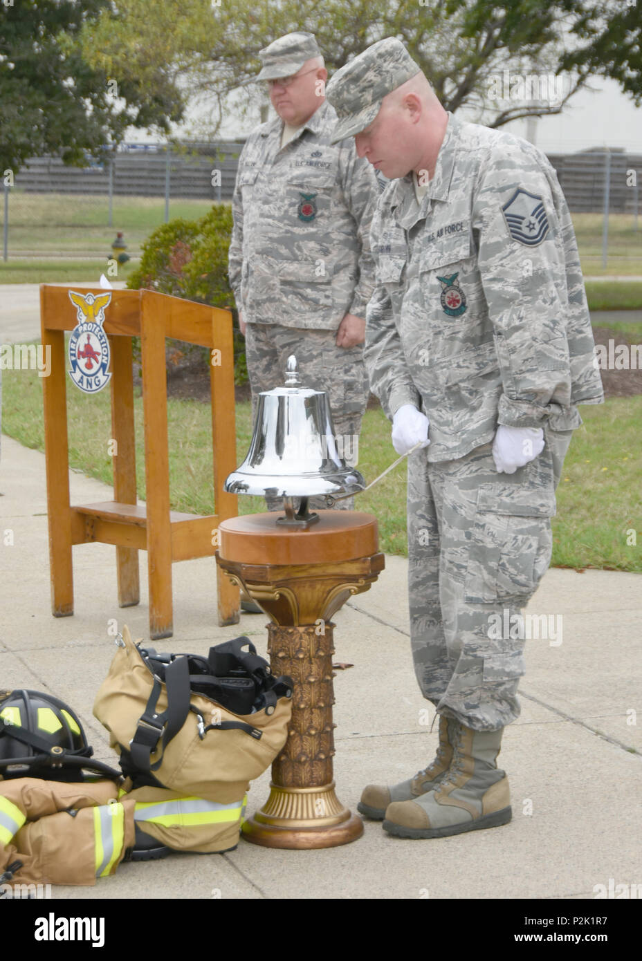 Airmen from the 143d Airlift Wing Fire Department conduct a memorial ...