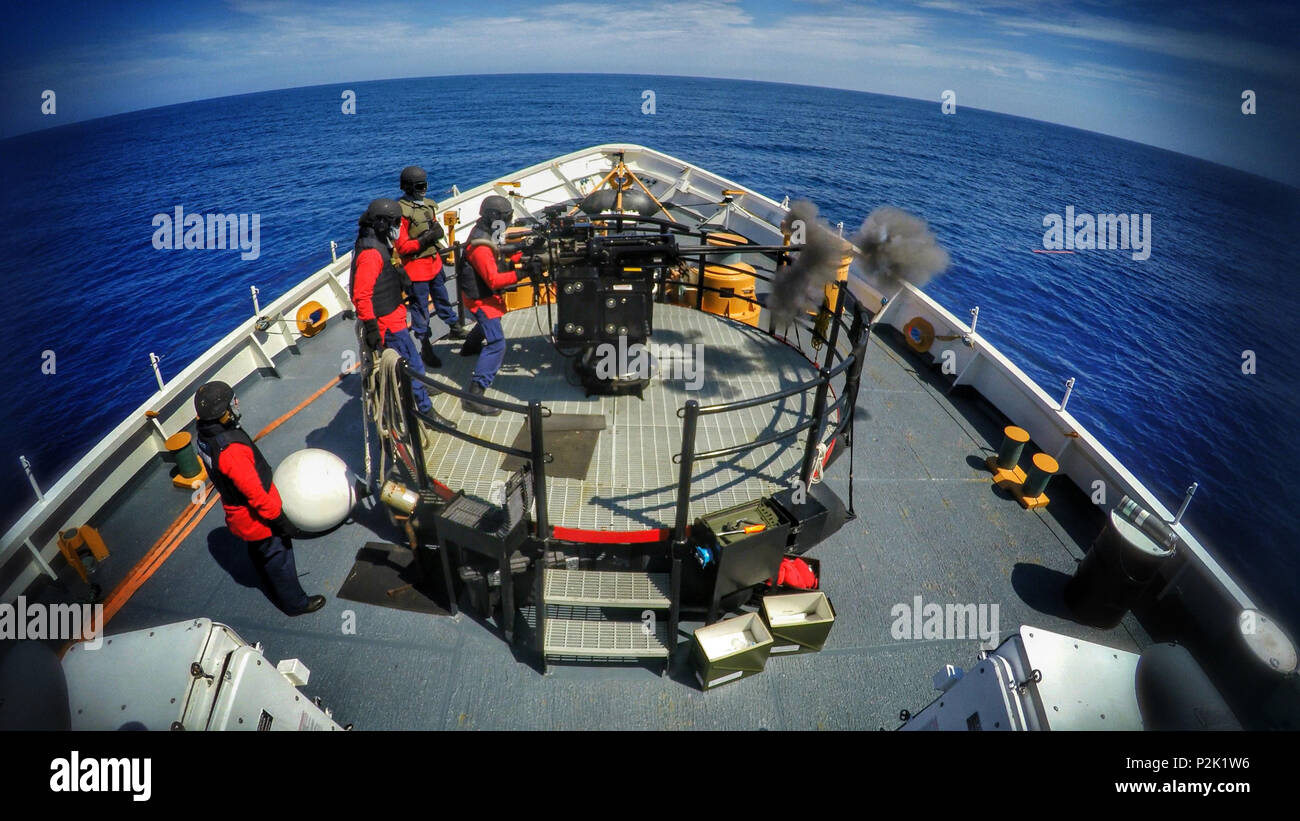 A crewmember aboard the Coast Guard Cutter Active, a 210-foot medium ...