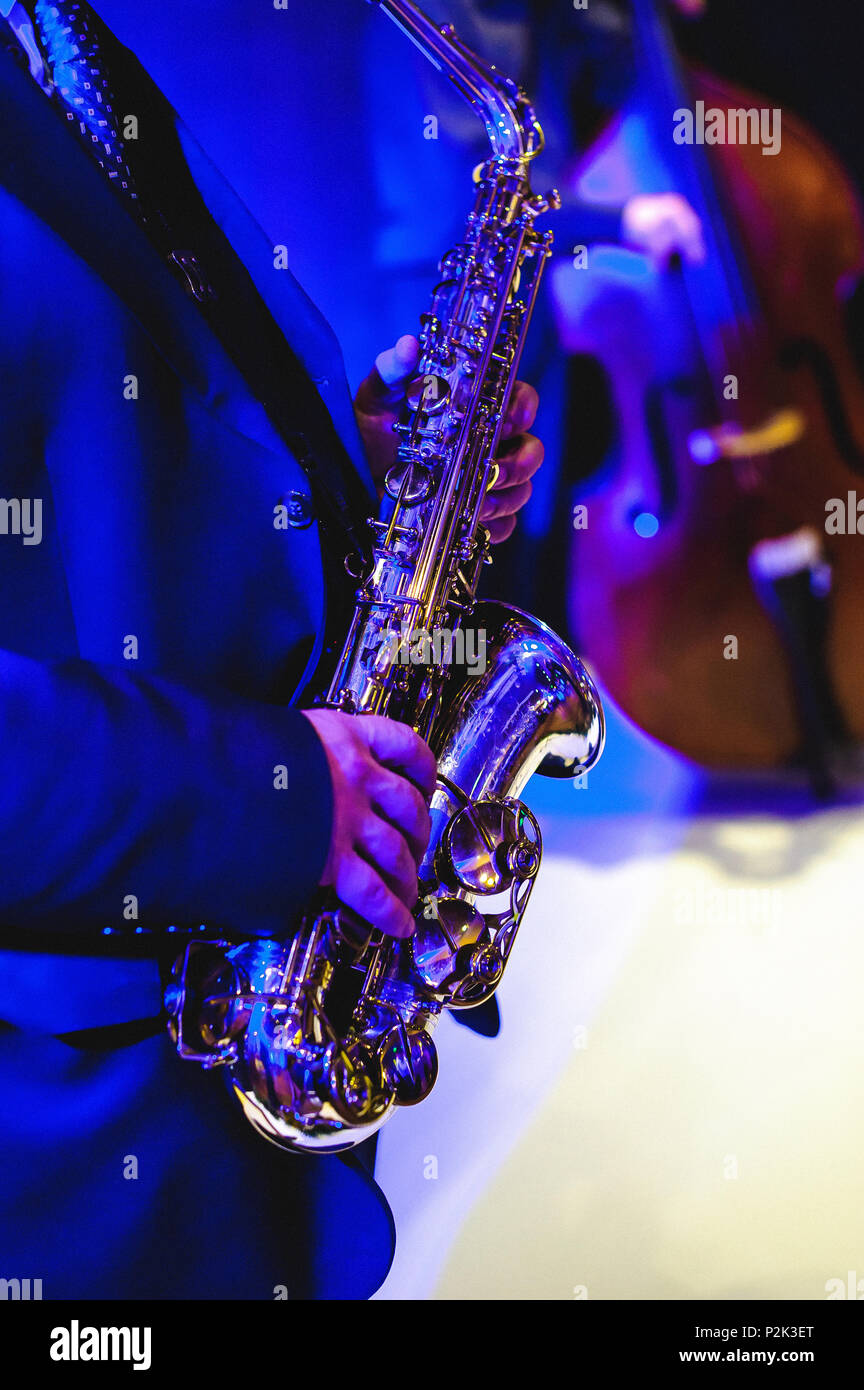 musician plays the saxophone performance at a concert Stock Photo - Alamy