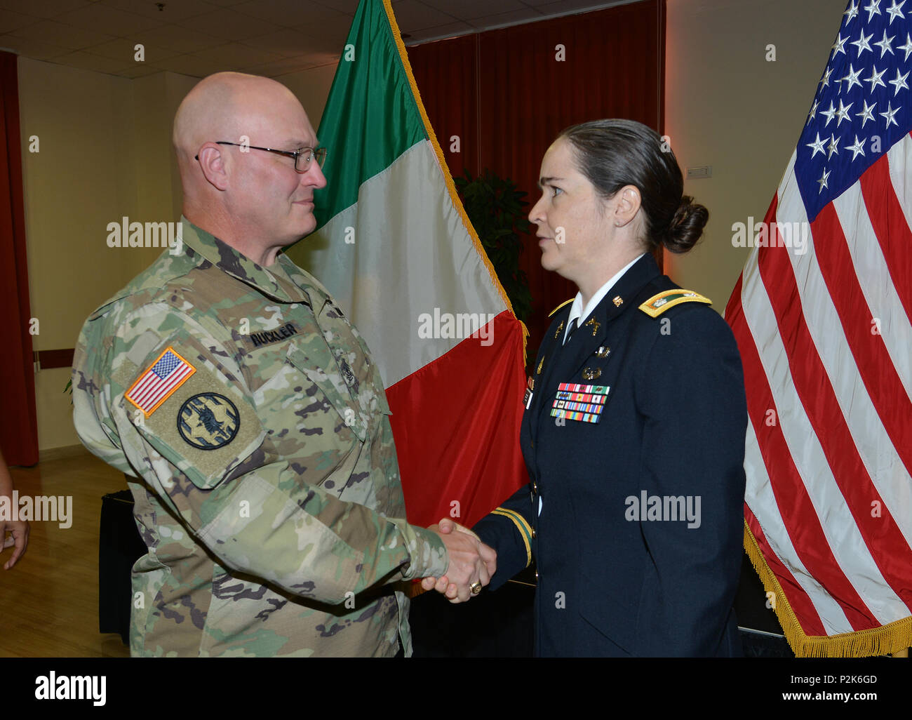 Sgt. Maj. Joseph S. Buckler, U.S. Army Africa, congratulates Lt. Col ...
