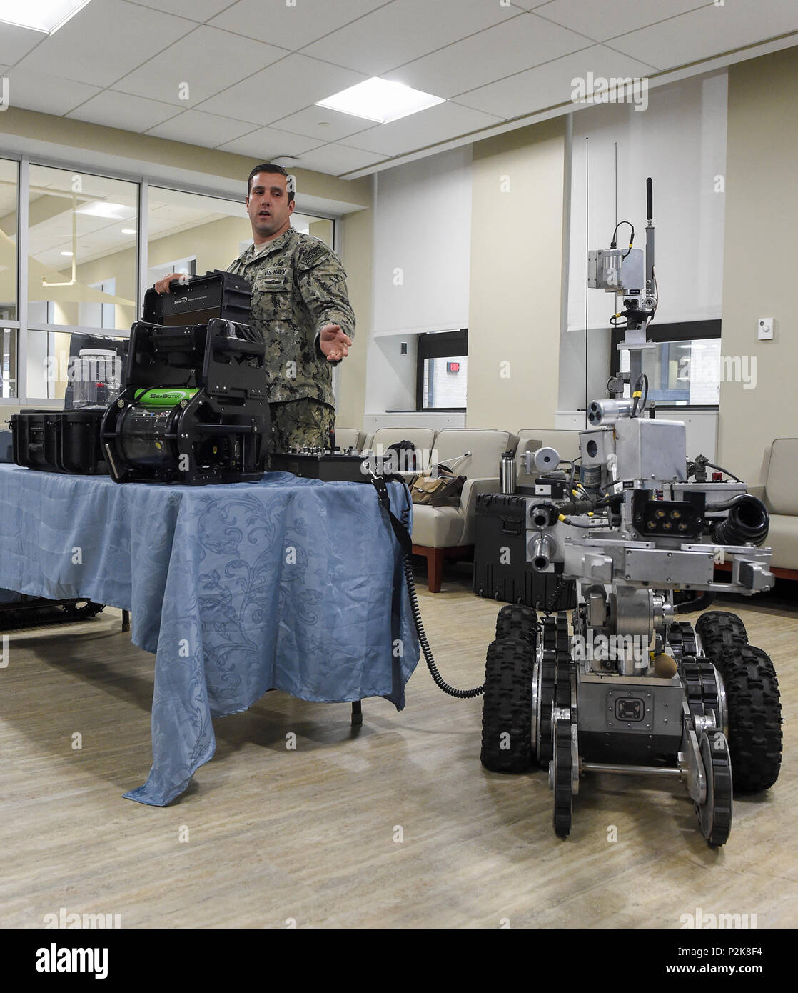 Petty Officer 2nd Class from Explosive Ordnance Disposal Mobile Unit 12 ...