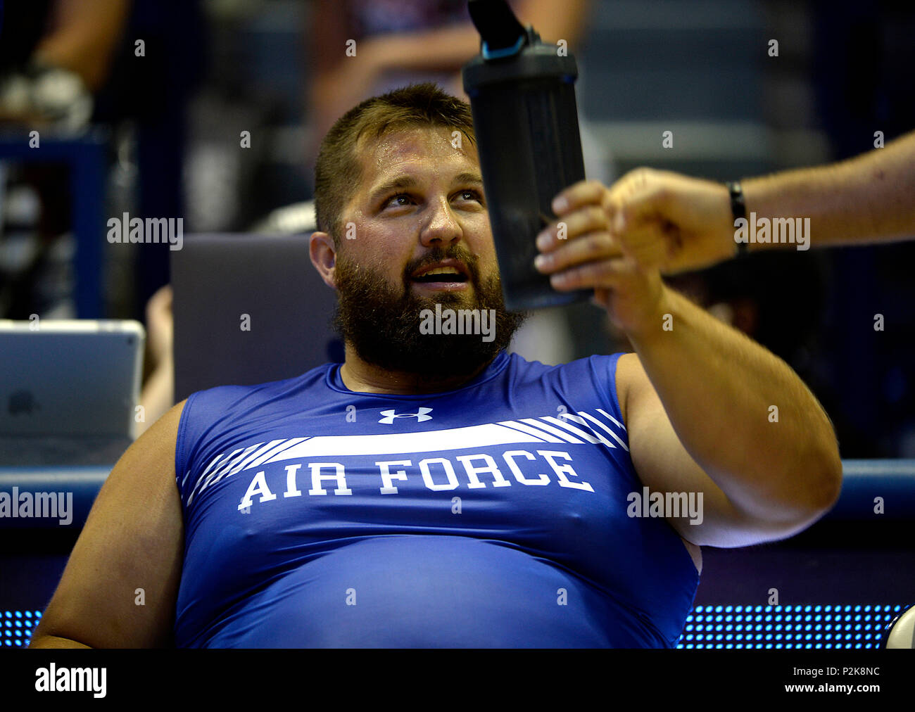 Team Air Force athlete Capt. Rob Hufford II gives a fist bump to his ...