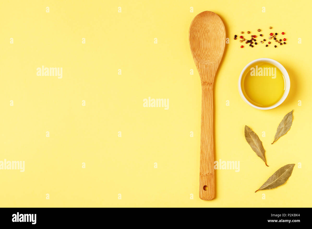 Flat lay pastel tone background. Ingredients for cooking on a yellow ...