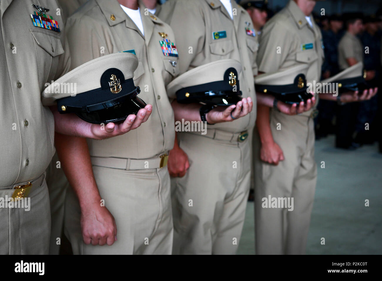 MARINE CORPS BASE HAWAII – Sailors wait to present newly promoted chief ...