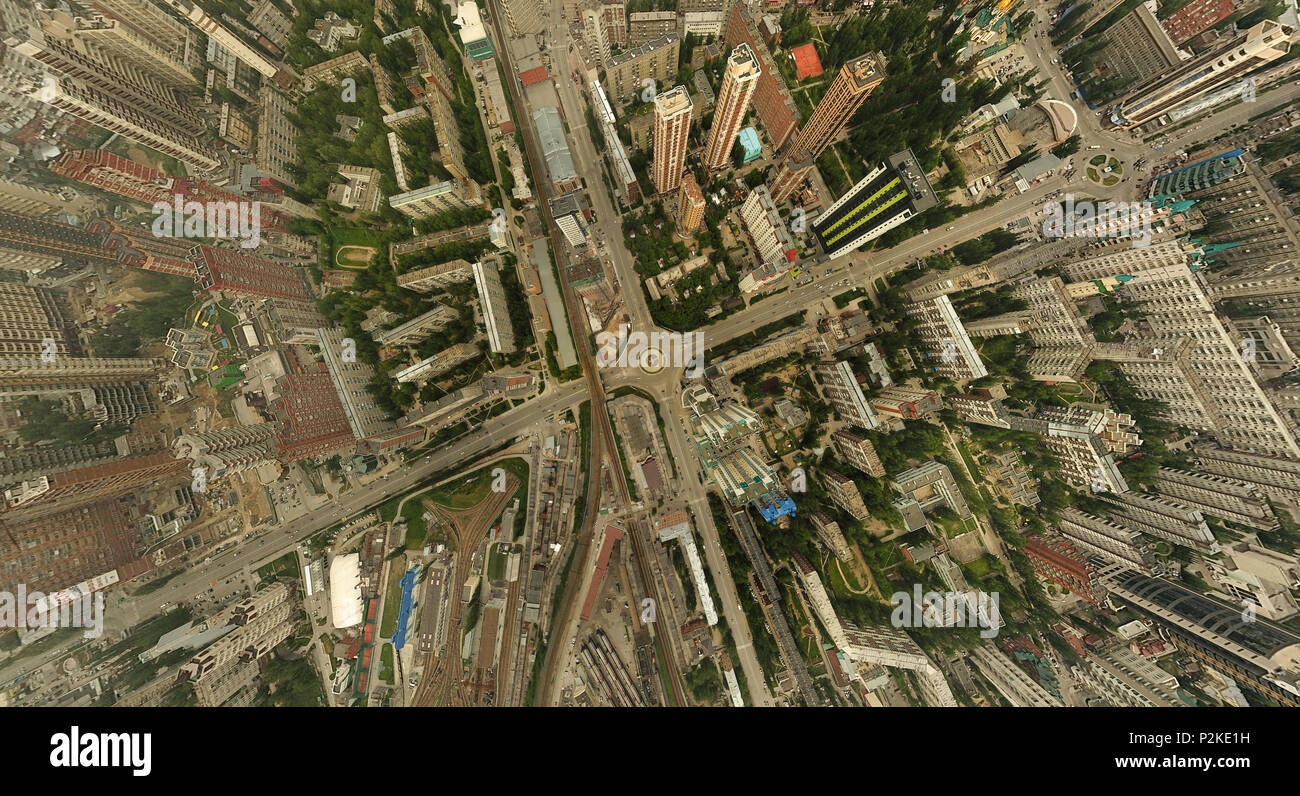 Aerial view of square in the city with roundabout traffic, streets and ...