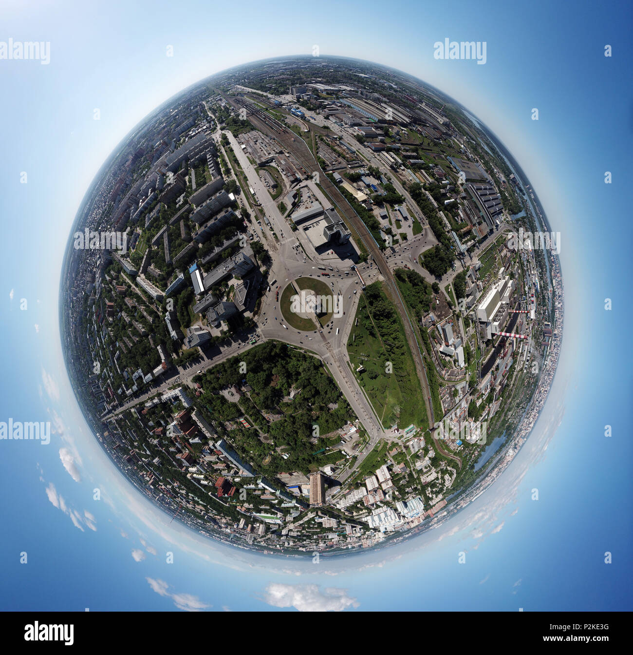 Aerial view of square in the city with roundabout traffic, streets and ...
