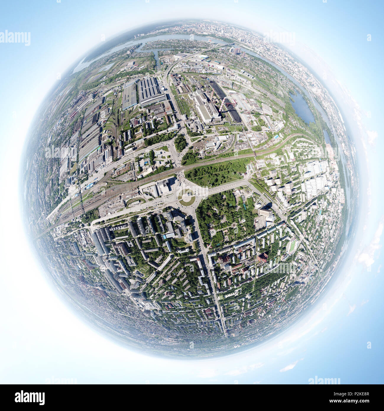 Aerial view of square in the city with roundabout traffic, streets and ...