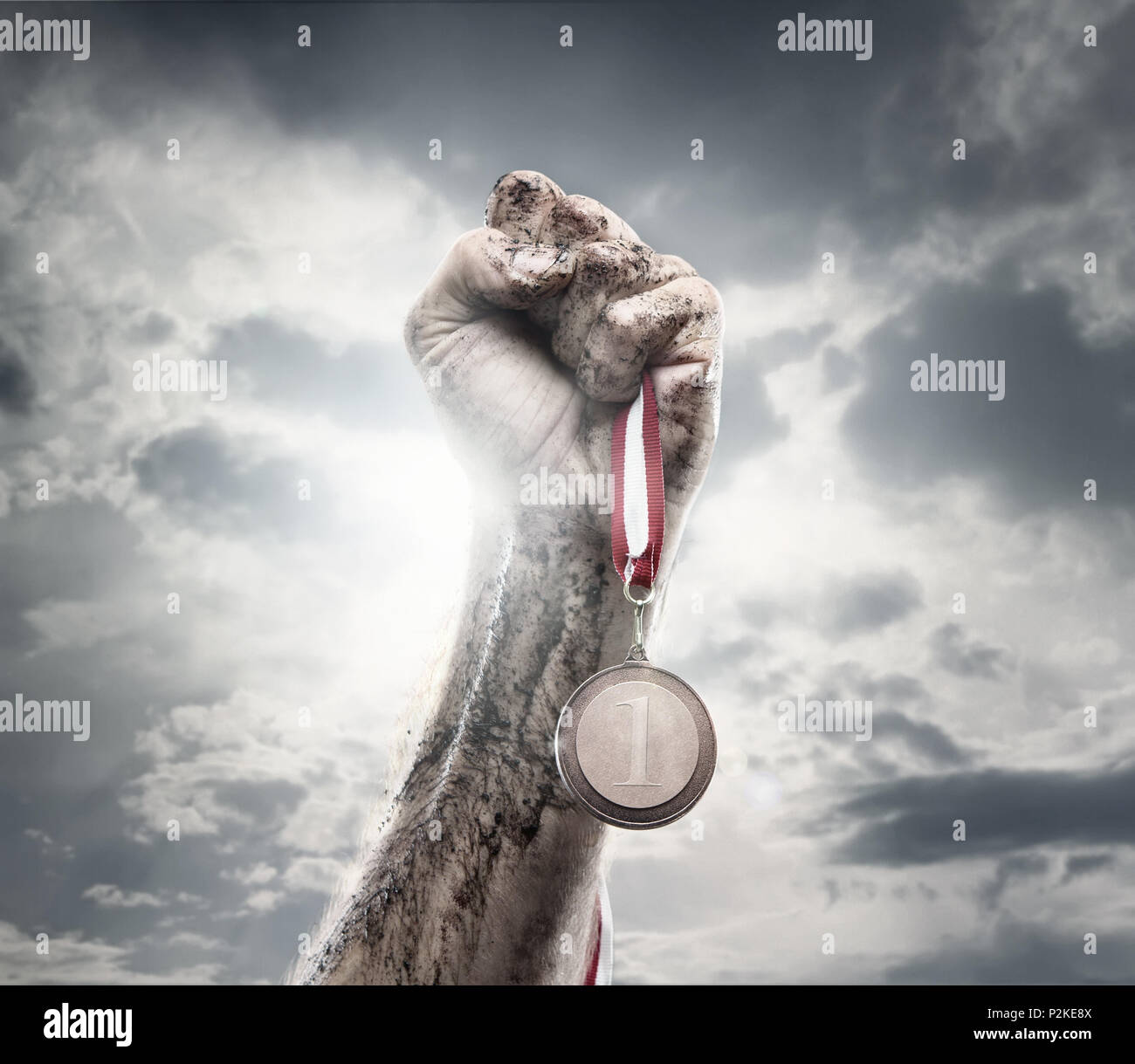 Medal hand gold ribbon hi-res stock photography and images - Alamy