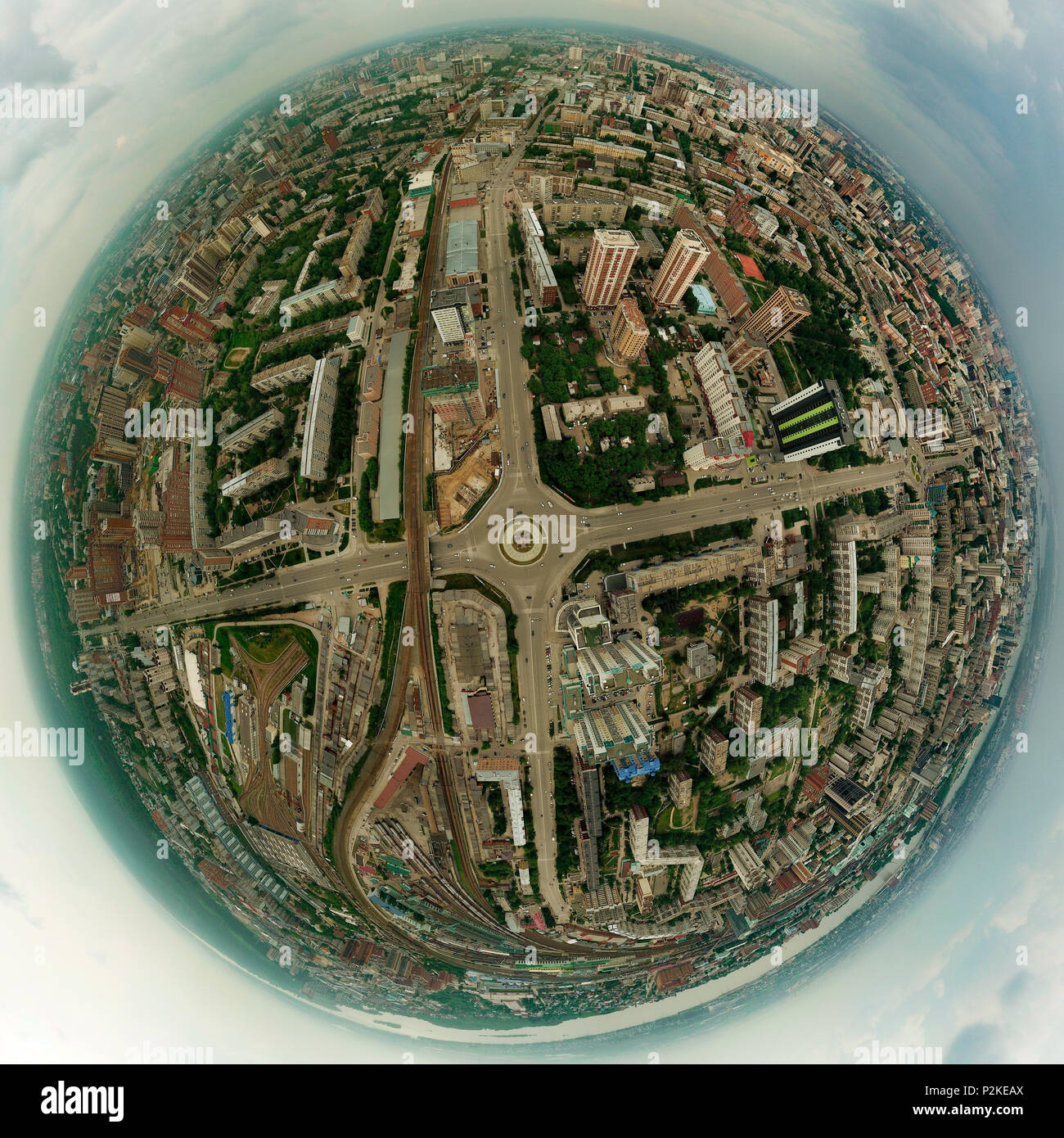 Aerial view of square in the city with roundabout traffic, streets and ...