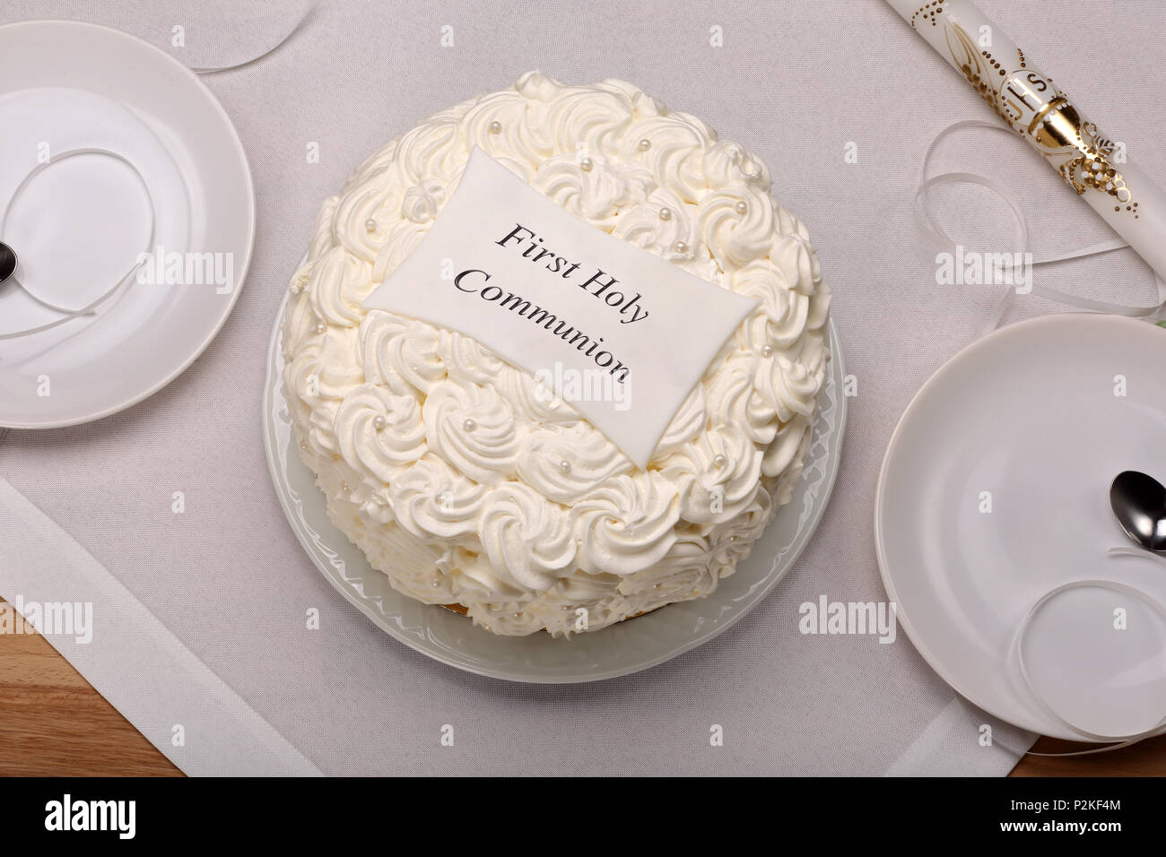 First holy communion cake on wooden background and space for text Stock ...