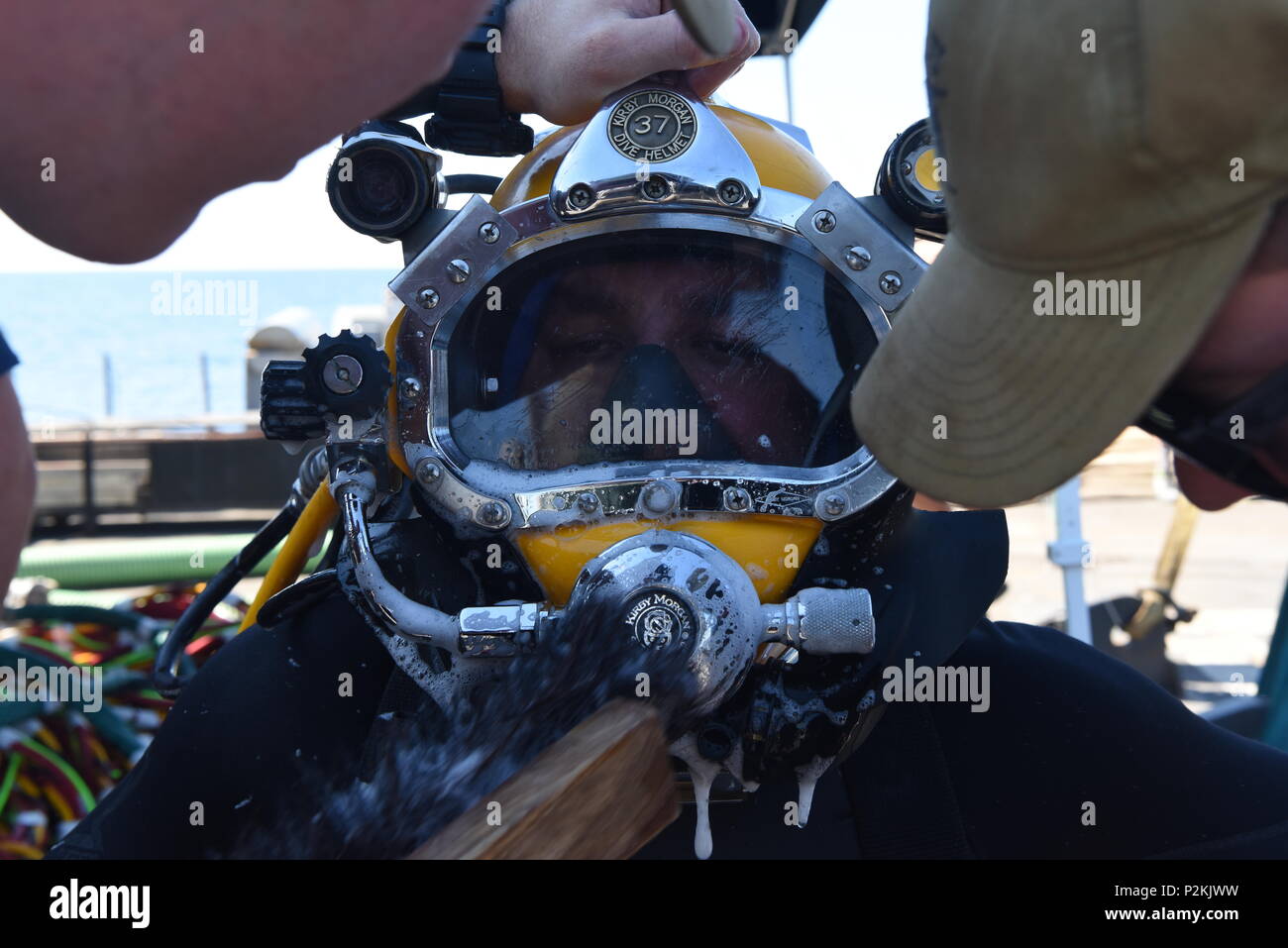 U.S. Navy Diver 1st Class Tony Russo, of the Mobile Diving and Salvage ...