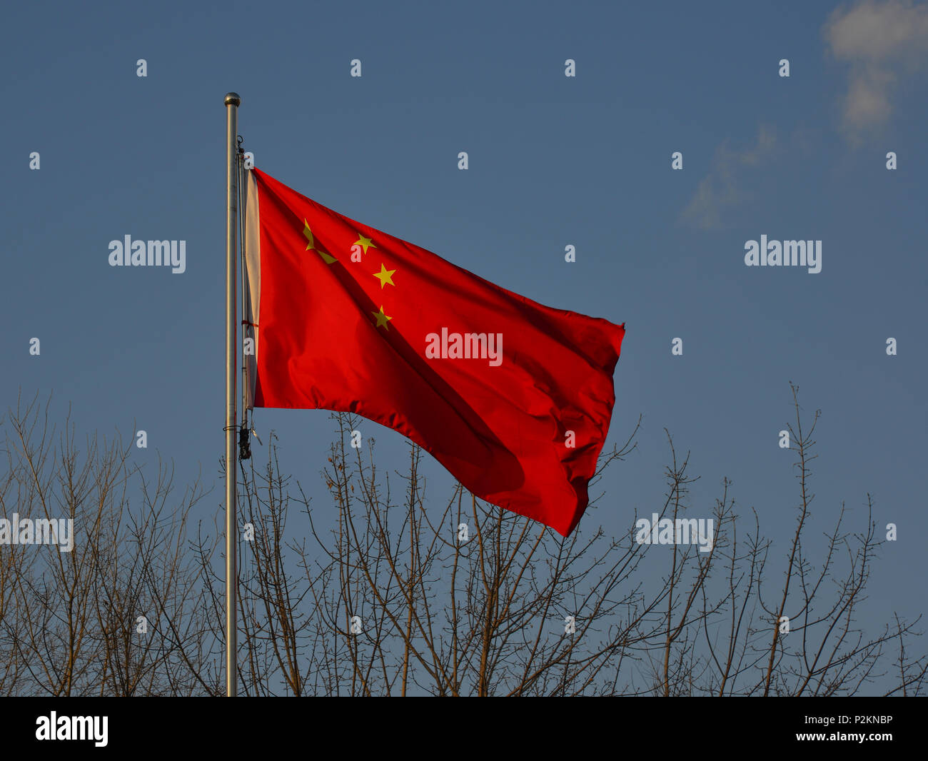 National flag of China on a flagpole at public park Stock Photo - Alamy